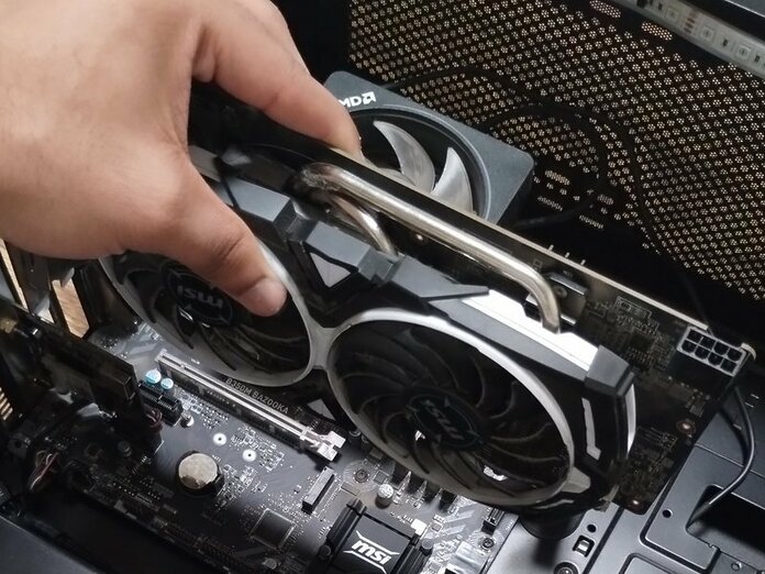 How To Remove GPU From The Motherboard - Tech4Gamers